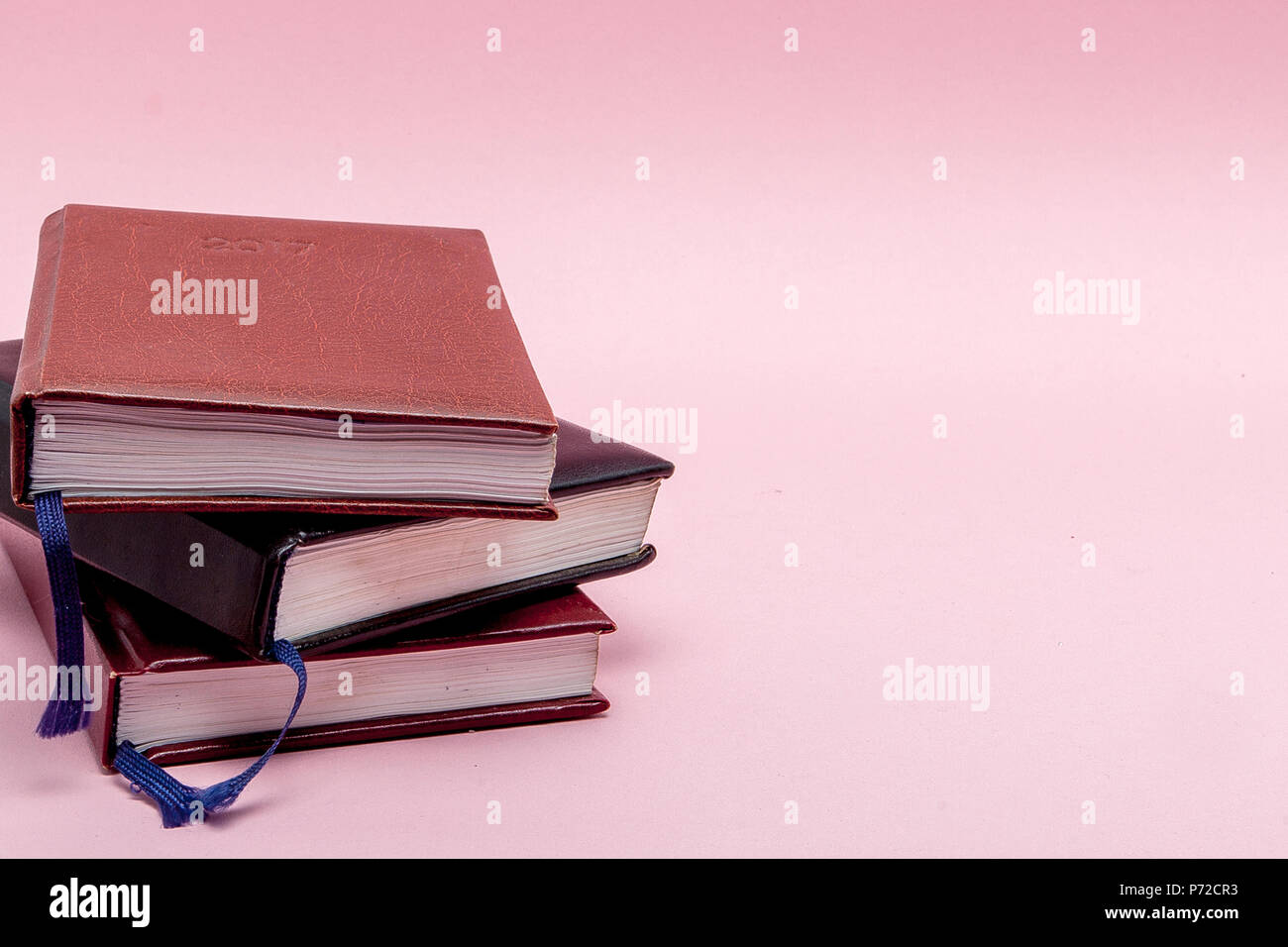 Notebook page on pink background - Flat lay Stock Photo - Alamy