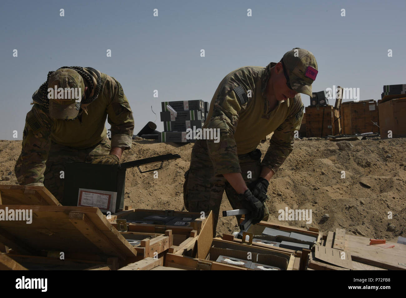 Two Explosive Ordnance Disposal technicians with the 386th ...