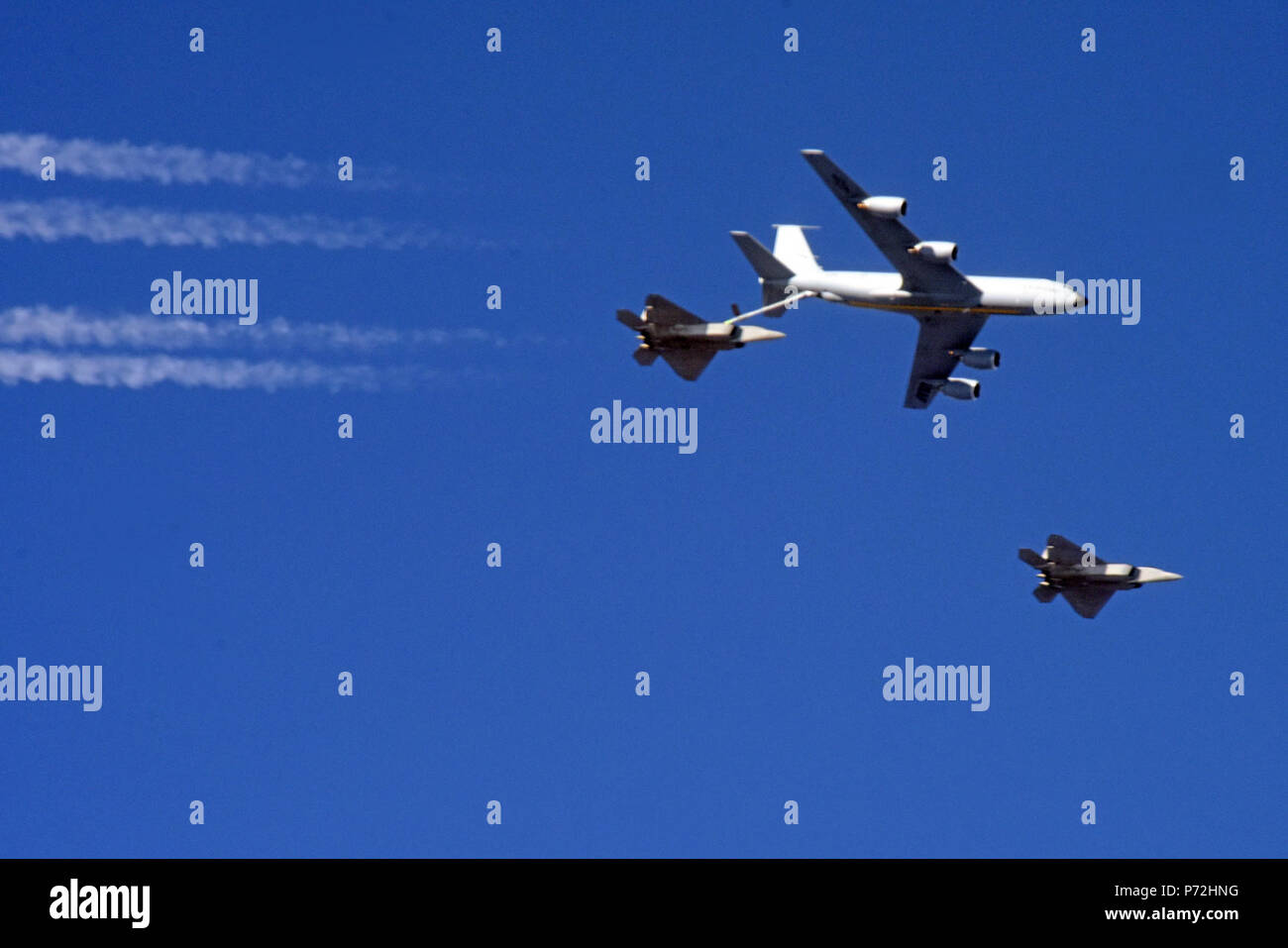 JOINT PACIFIC ALASKA RANGE COMPLEX, Alaska – Two U.S. Air Force F-22 ...