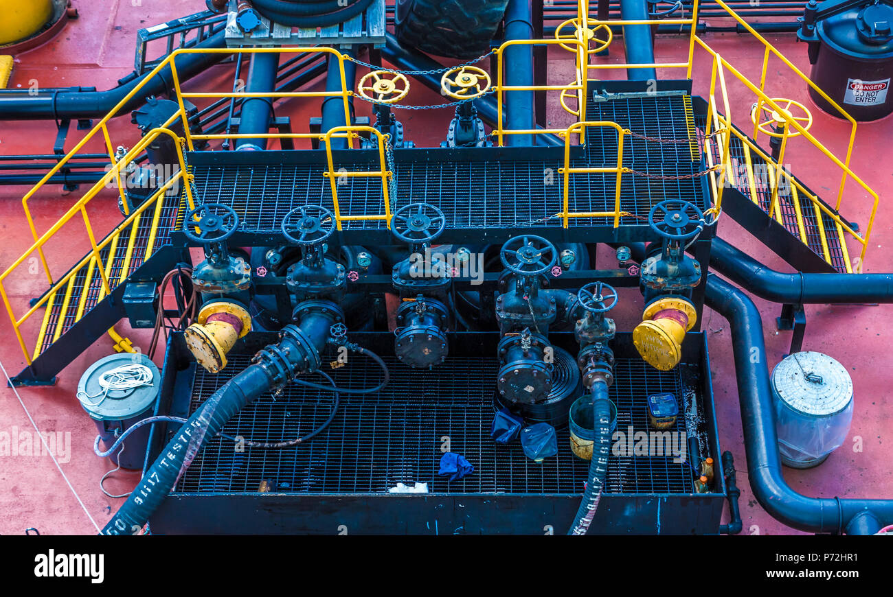 Black and Yellow Pipes and Valves on Refueling Barge Stock Photo - Alamy