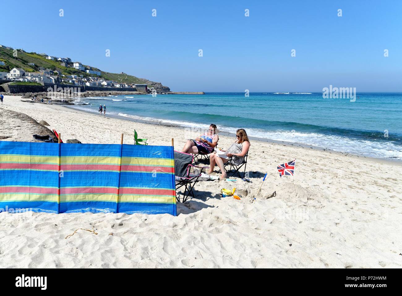 Sennen Cove and beach on a hot summers day Cornwall England UK Stock ...