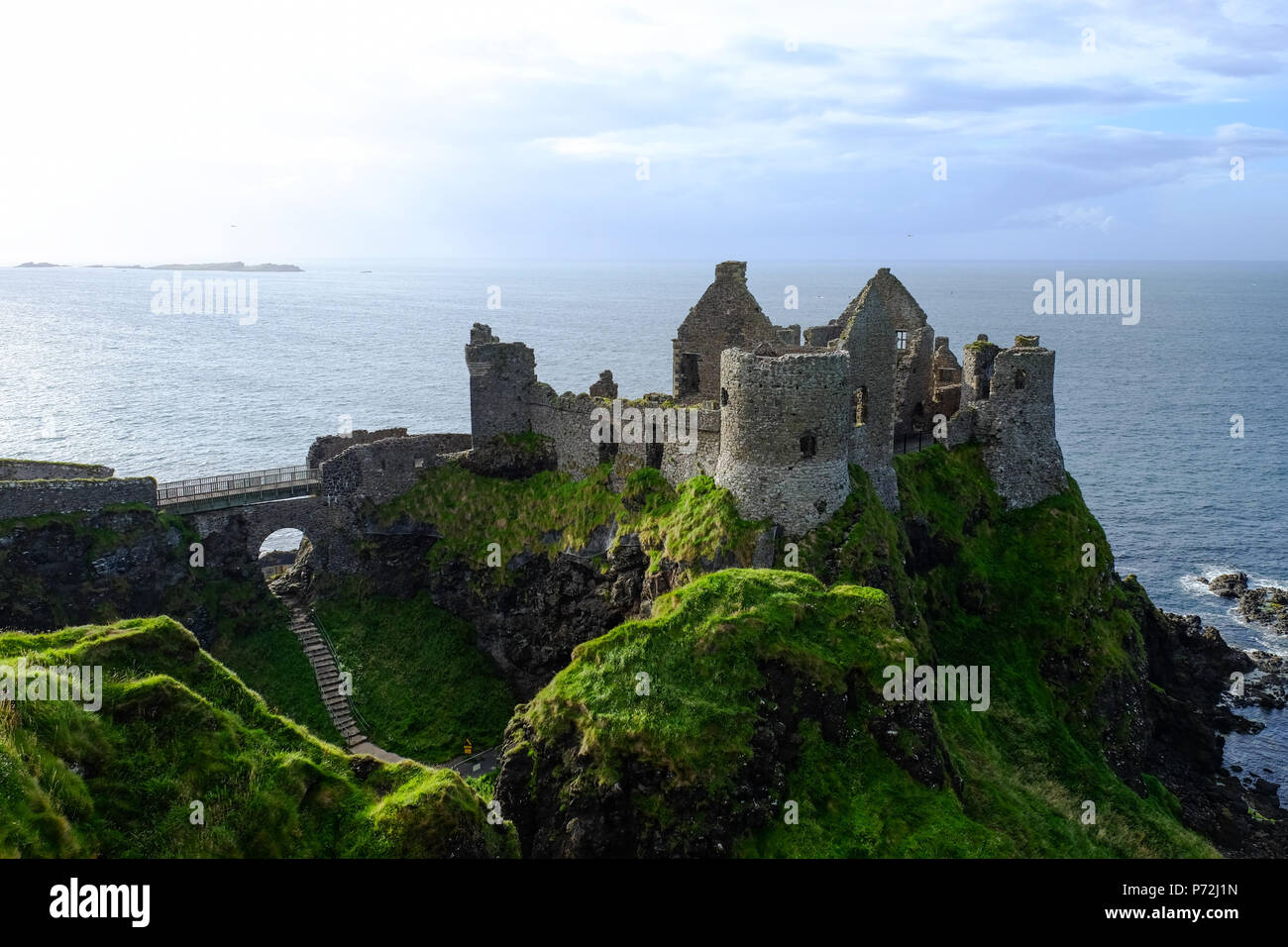 Dunluce Castle, located on the edge of a basalt outcropping in County ...
