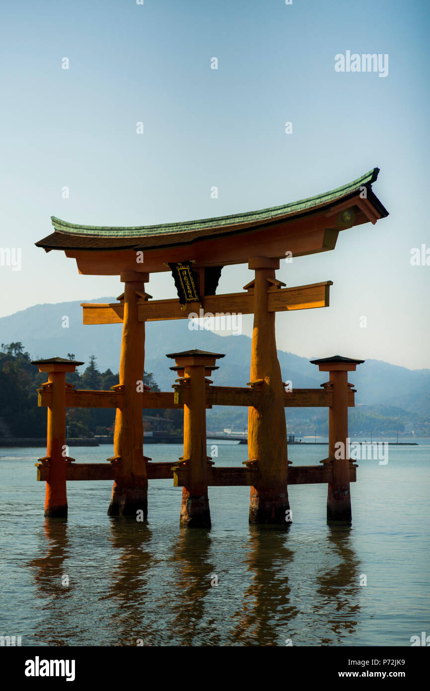 The floating red wooden torii gate of Itsukushima Shrine on Miyajima ...