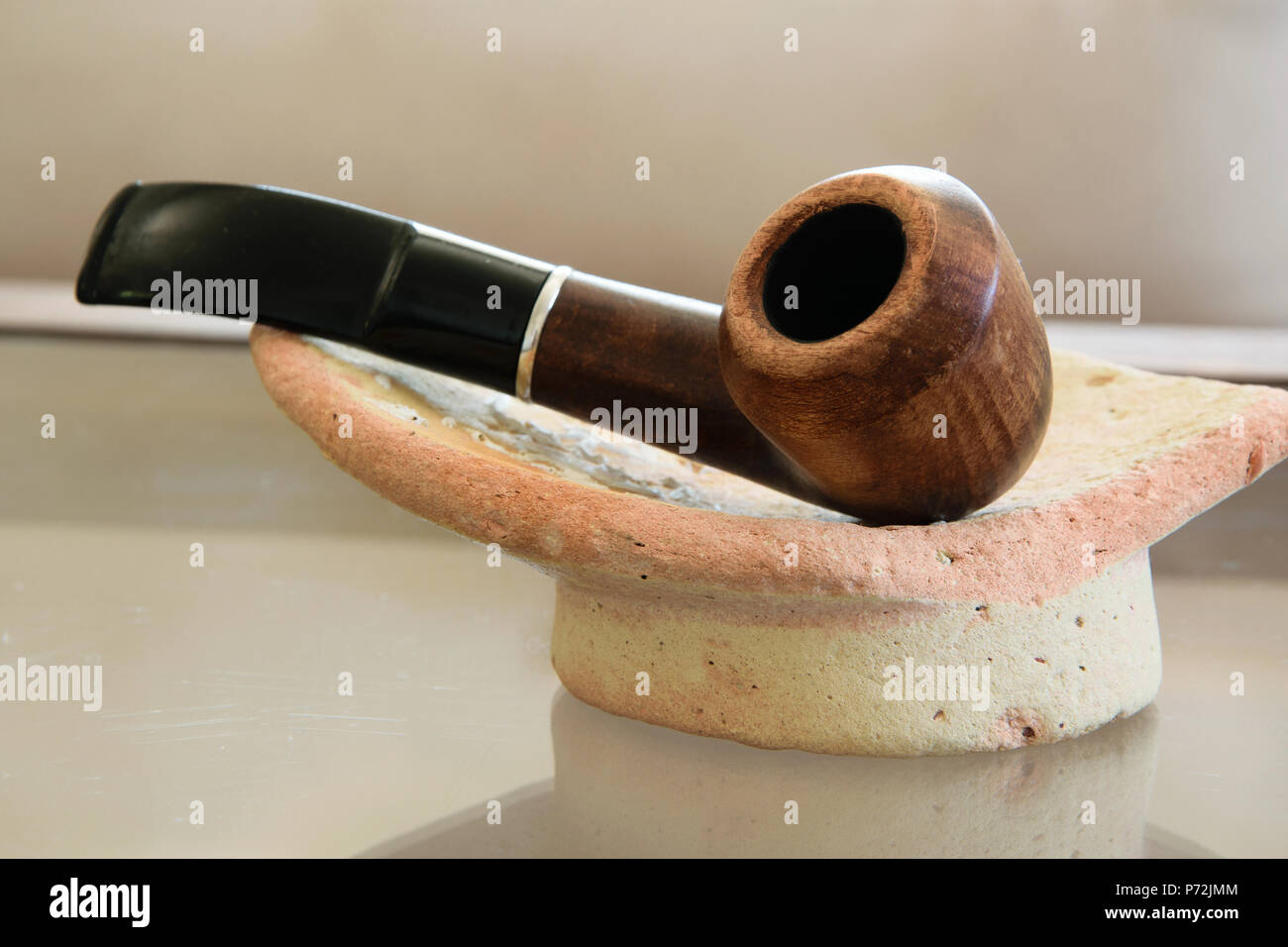 Elegant handmade smoking pipe Stock Photo - Alamy