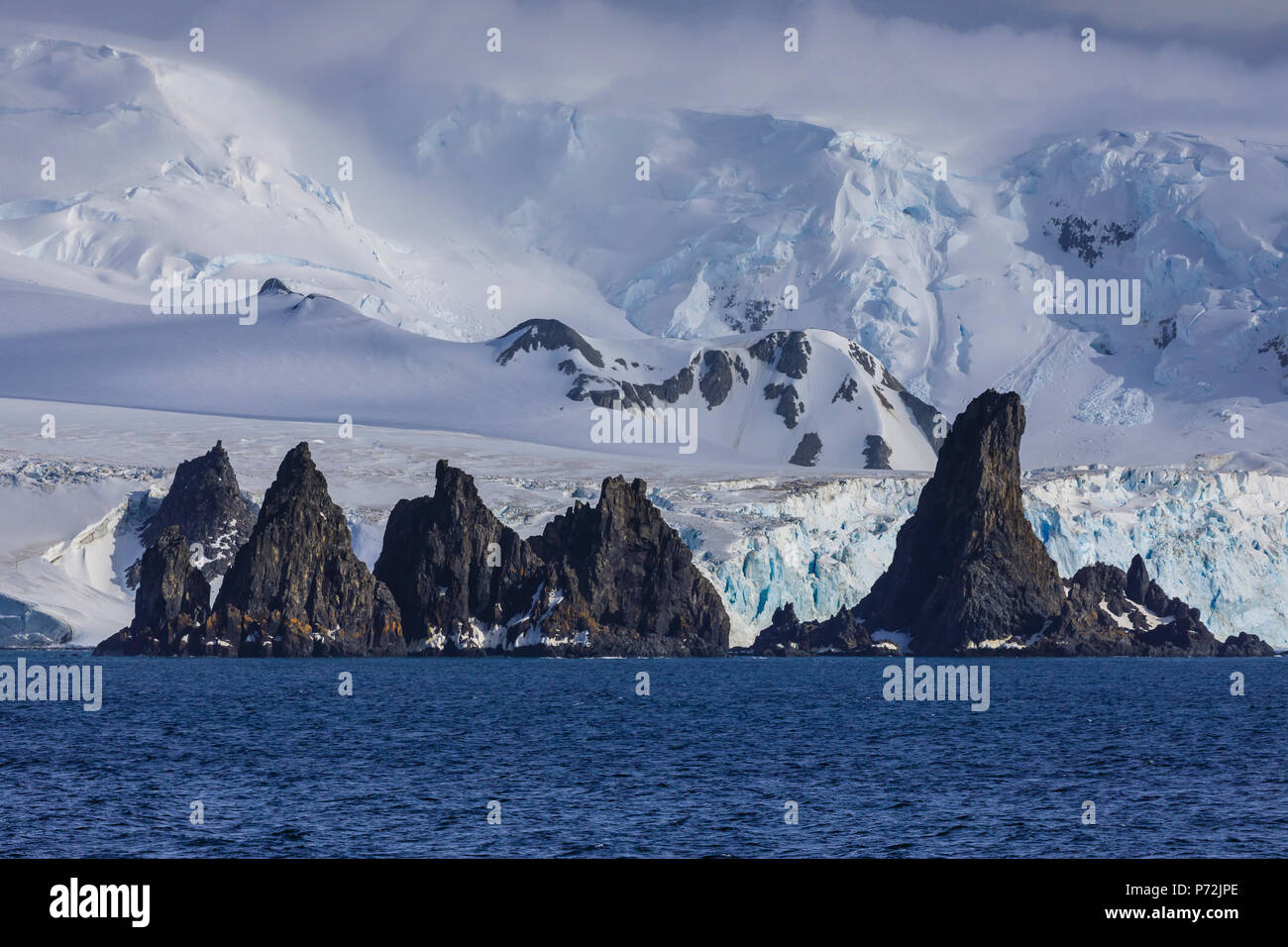 Pinnacle rocks, glaciers, mountains of Greenwich Island, from the sea ...