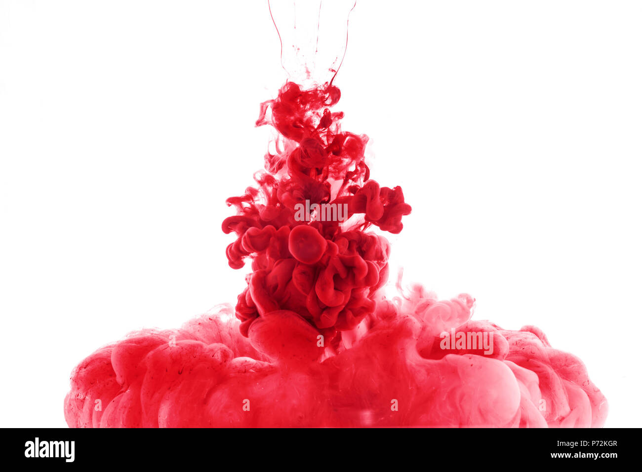 red paint splash in water, isolated on white Stock Photo - Alamy