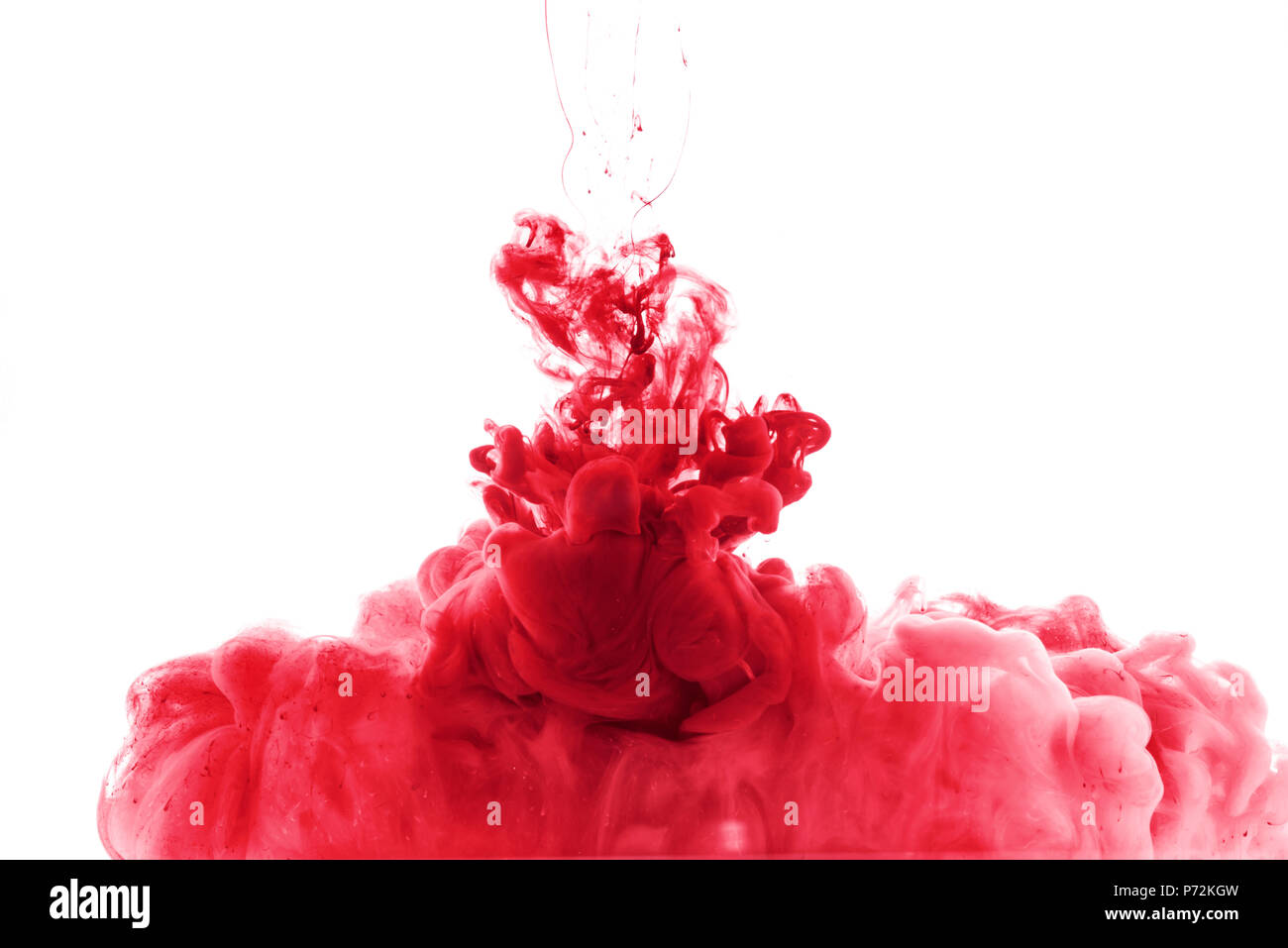 red paint splash in water, isolated on white Stock Photo - Alamy