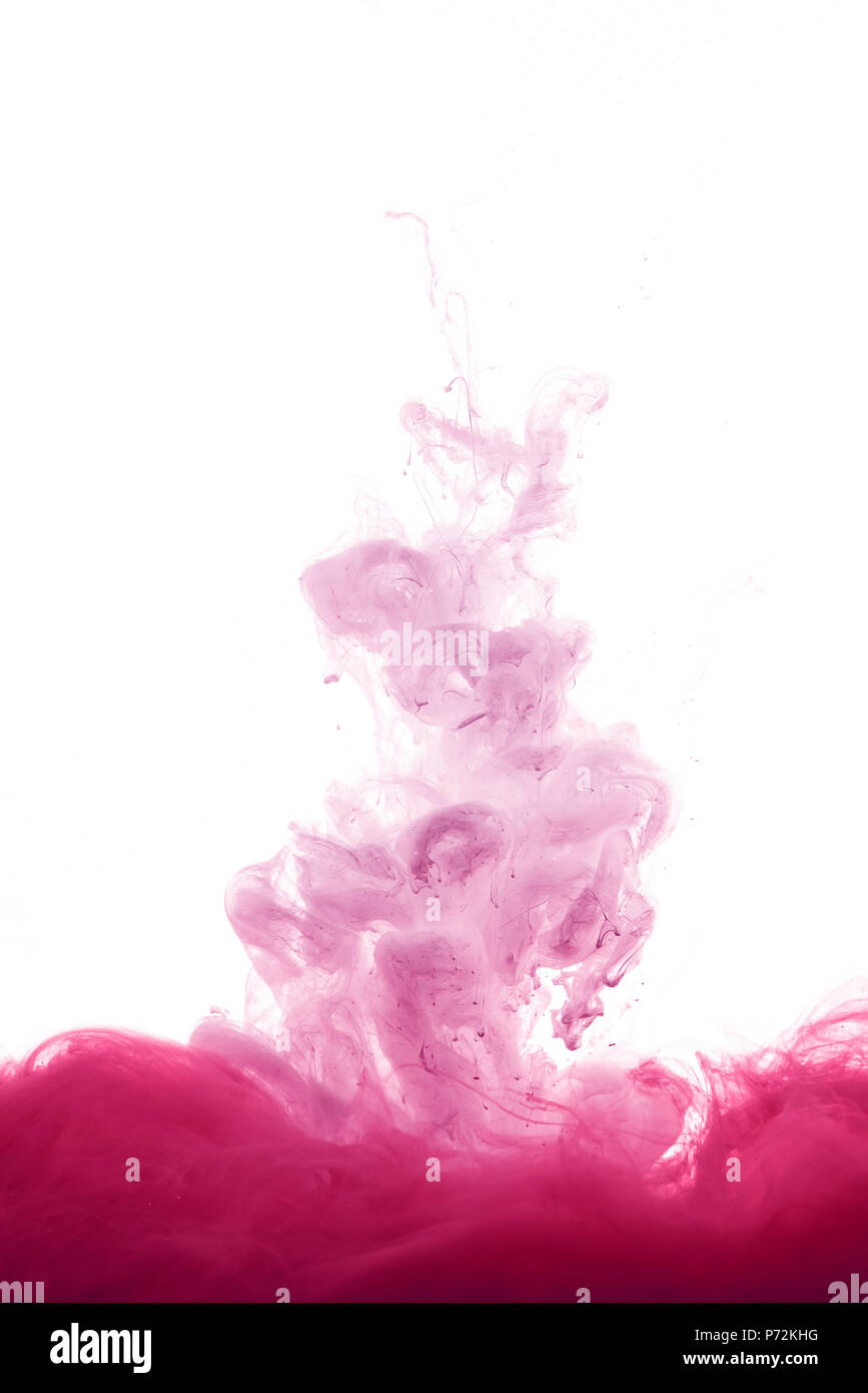 pink paint splash in water, isolated on white Stock Photo - Alamy