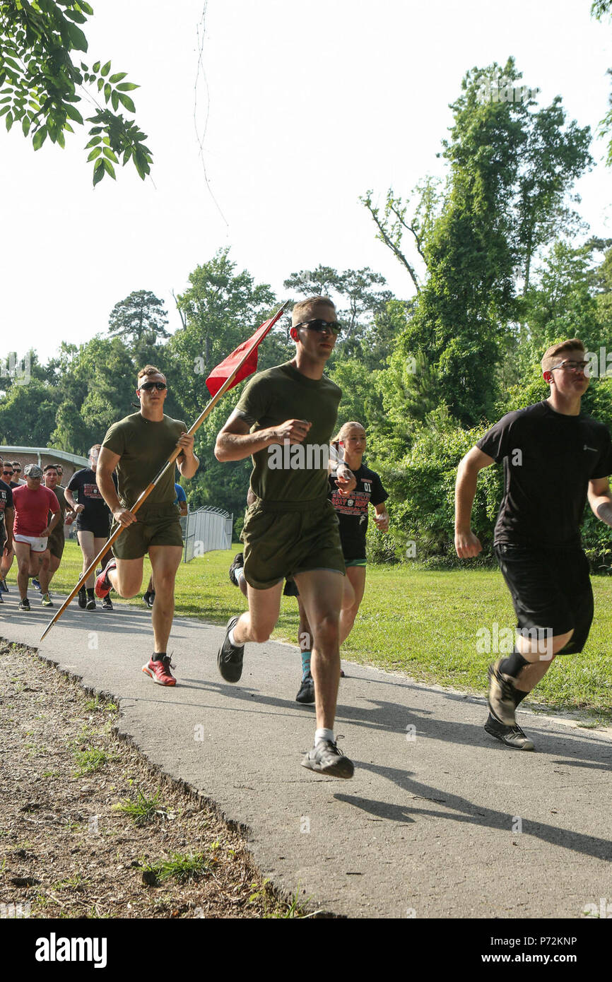 U.S. Marines within the Combat Camera occupational field participate in ...