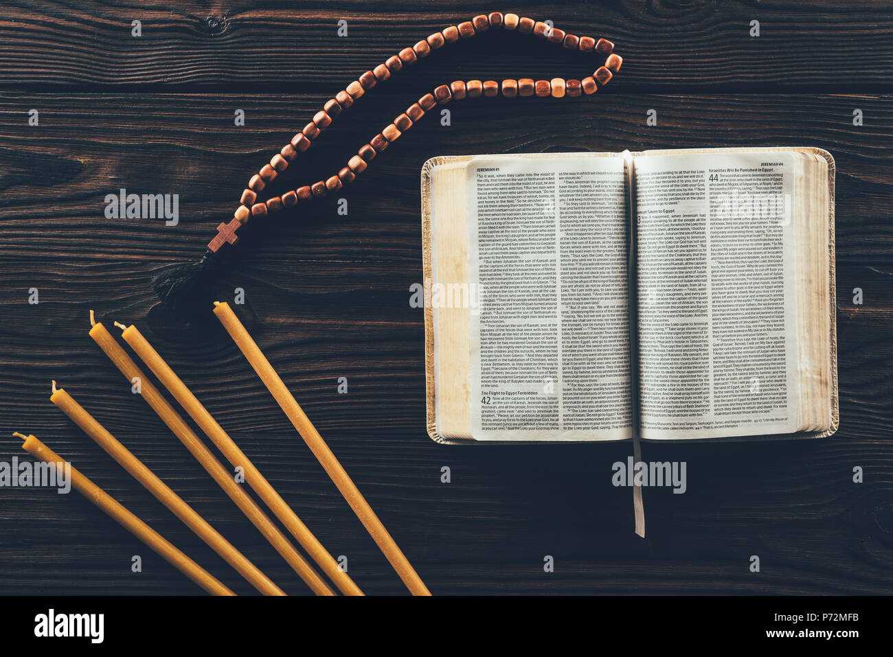 Open bible candles hi-res stock photography and images - Alamy