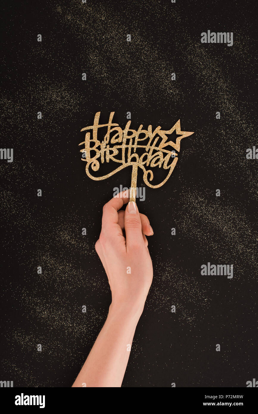 cropped shot of female hand holding happy birthday sign Stock Photo - Alamy