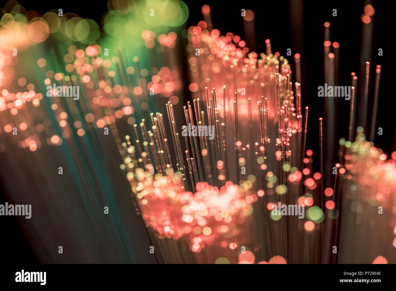 Close up of shiny pink fiber optics texture background Stock Photo - Alamy