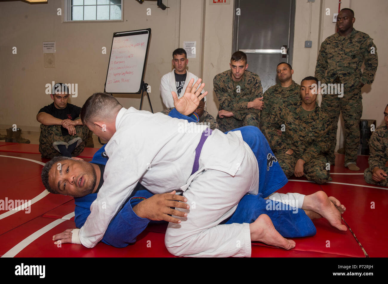 U.S. Marines receive instruction on basic Brazilian Jujitsu moves ...