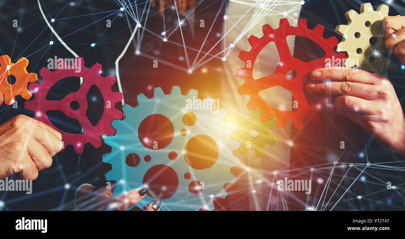 Business team connect pieces of gears. Teamwork, partnership and ...