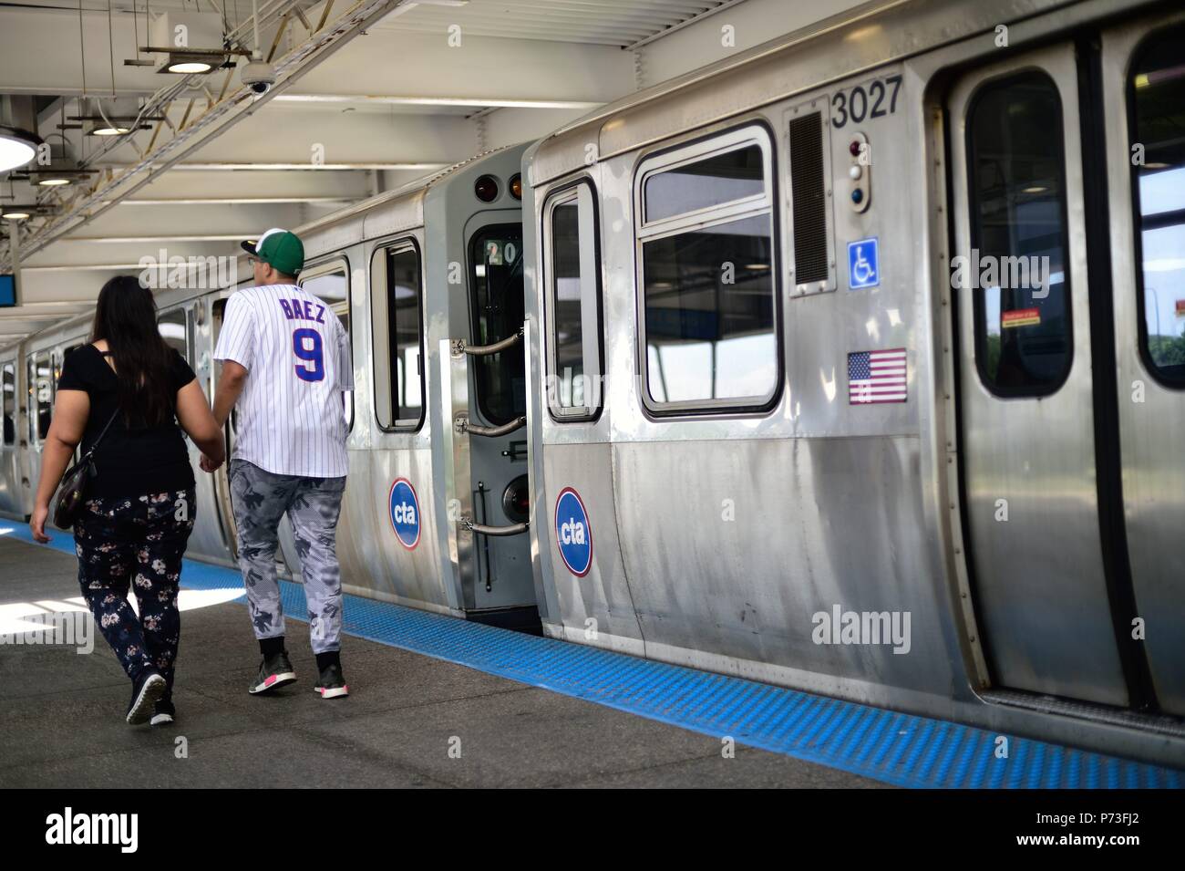 Chicago, Illinois, USA. Passengers exit a Blue Line train after it ...