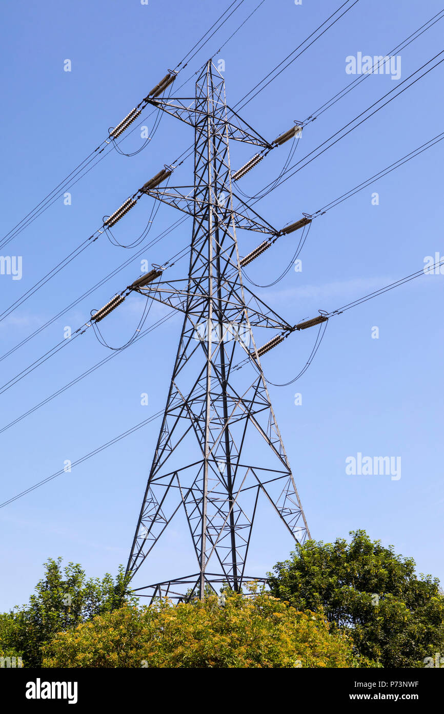 A view of an Electricity Pylon in the UK. A pylon is a tall structure ...