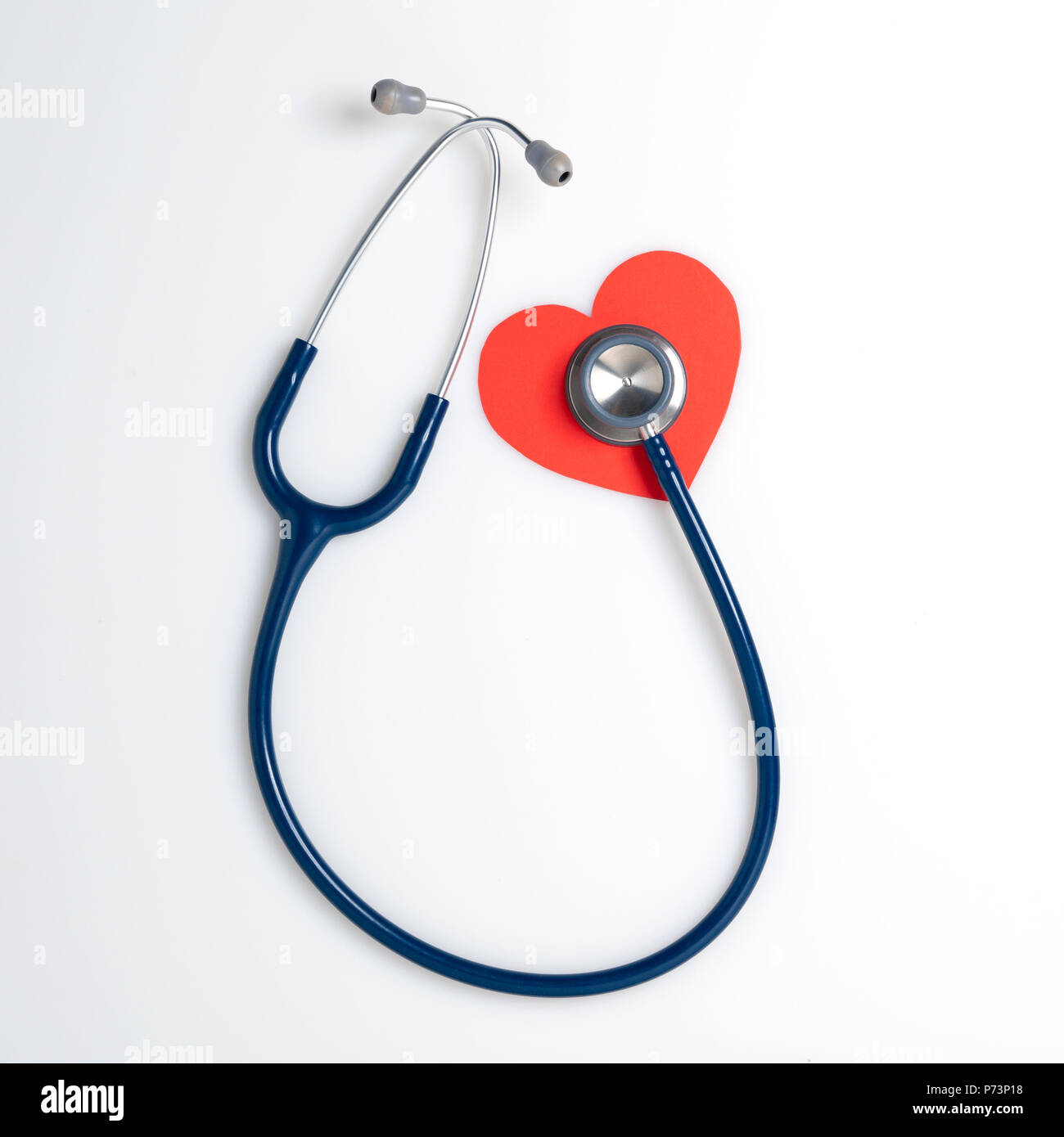 Top view blue stethoscope on white background. For check heart or ...