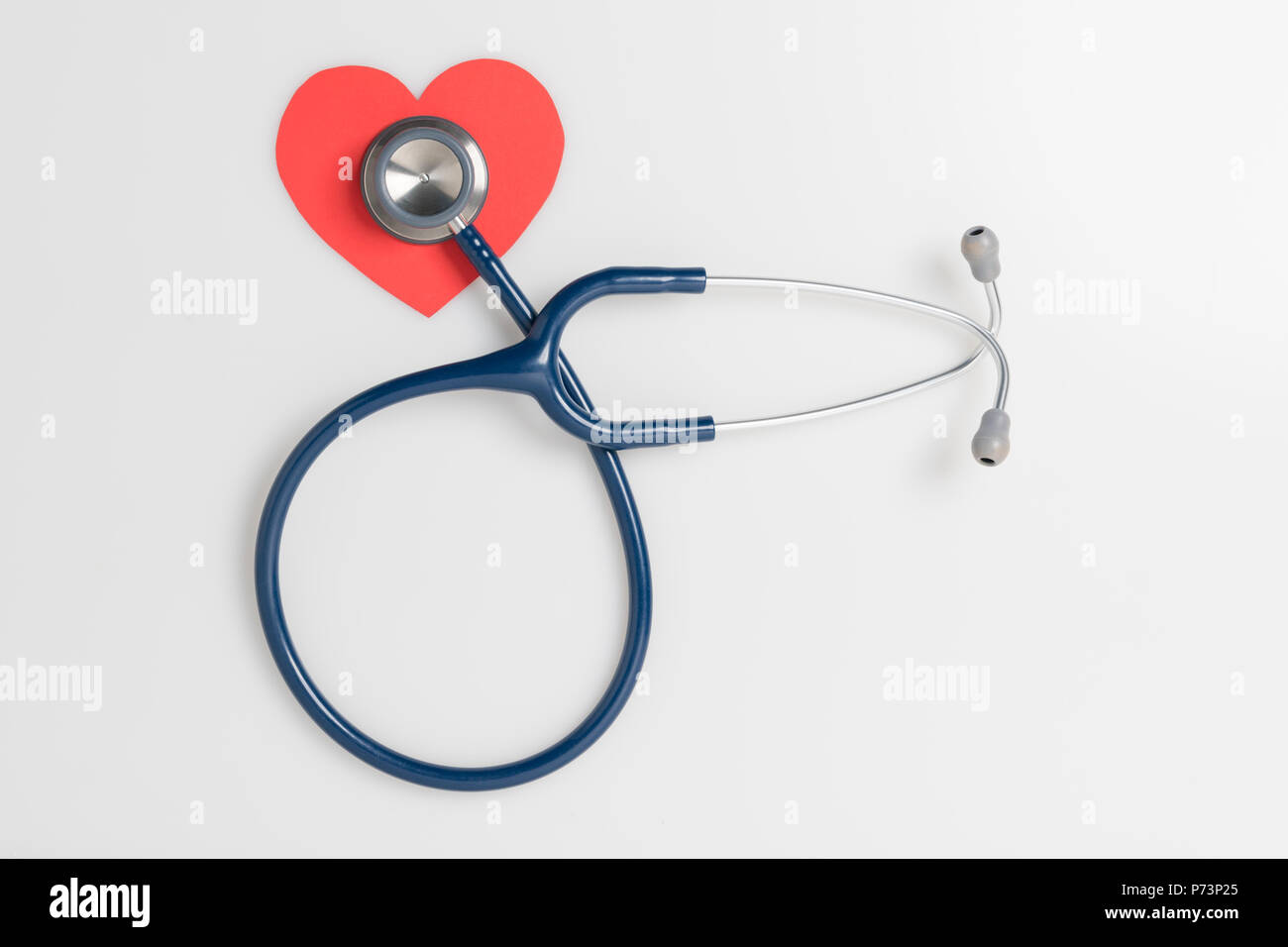 Top view blue stethoscope on white background. For check heart or ...