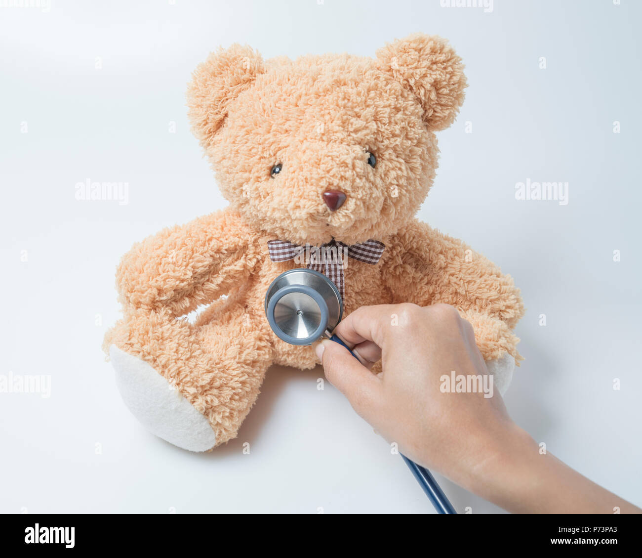 Health care teddy bear heart stethoscope isolated on white background ...