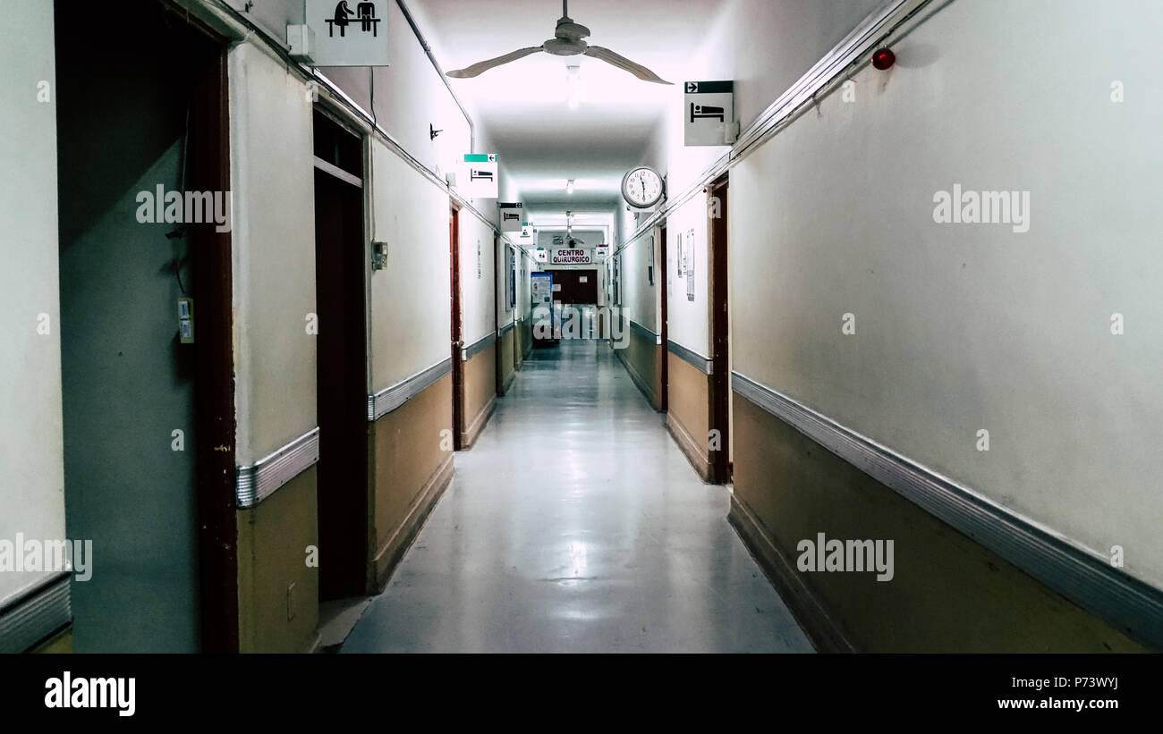 Empty long corridor in the hospital, at the end of the corridor you can ...