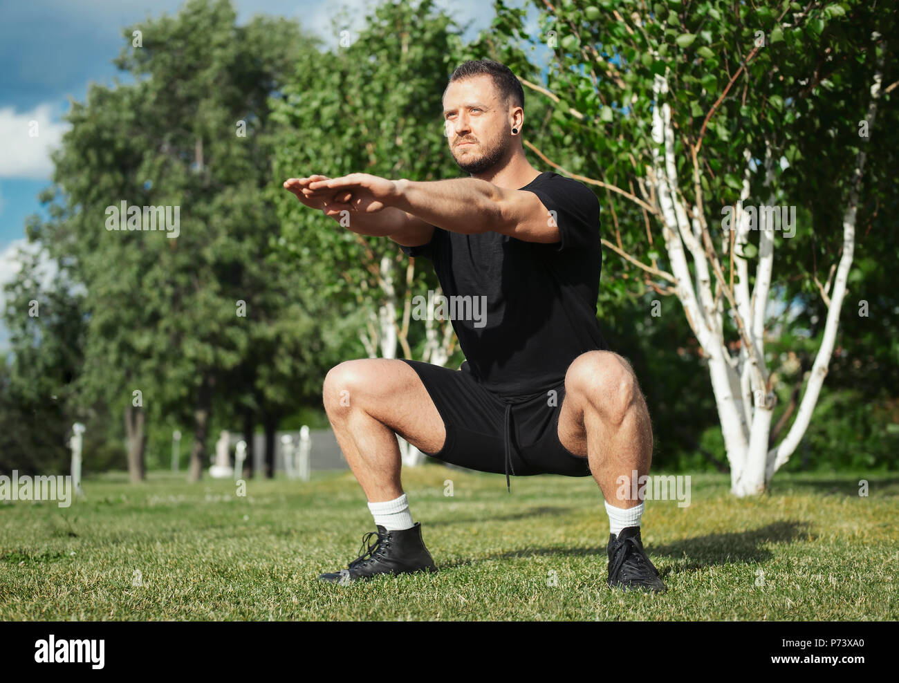 Male Athlete Squatting High Resolution Stock Photography and Images - Alamy