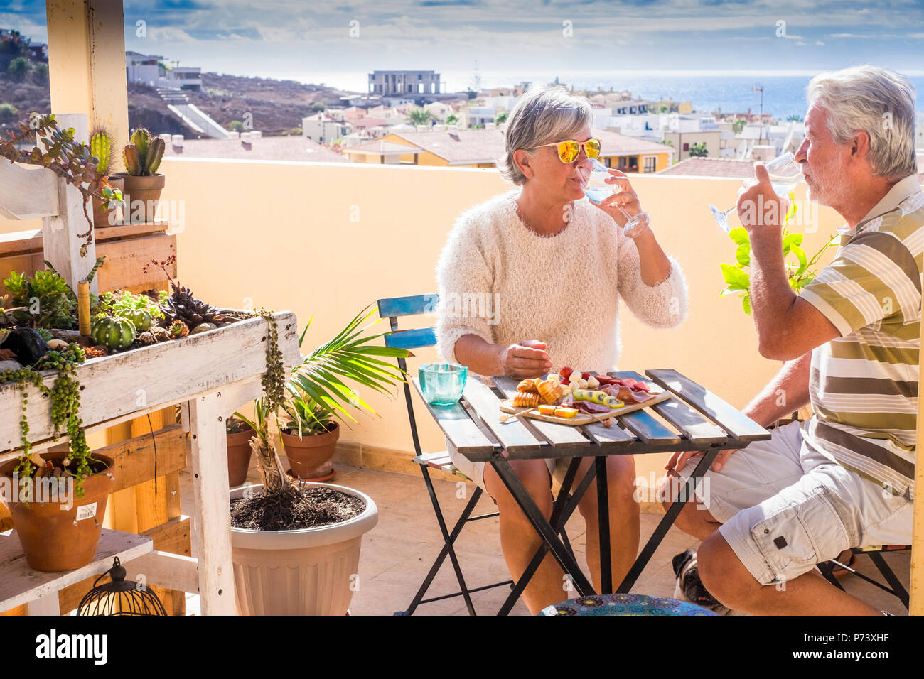 Old couple eating breakfast hi-res stock photography and images - Alamy