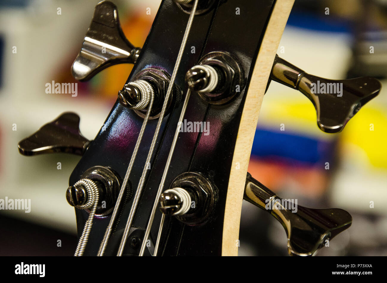 Beautiful guitar bass, under bright red color, blur background Stock ...