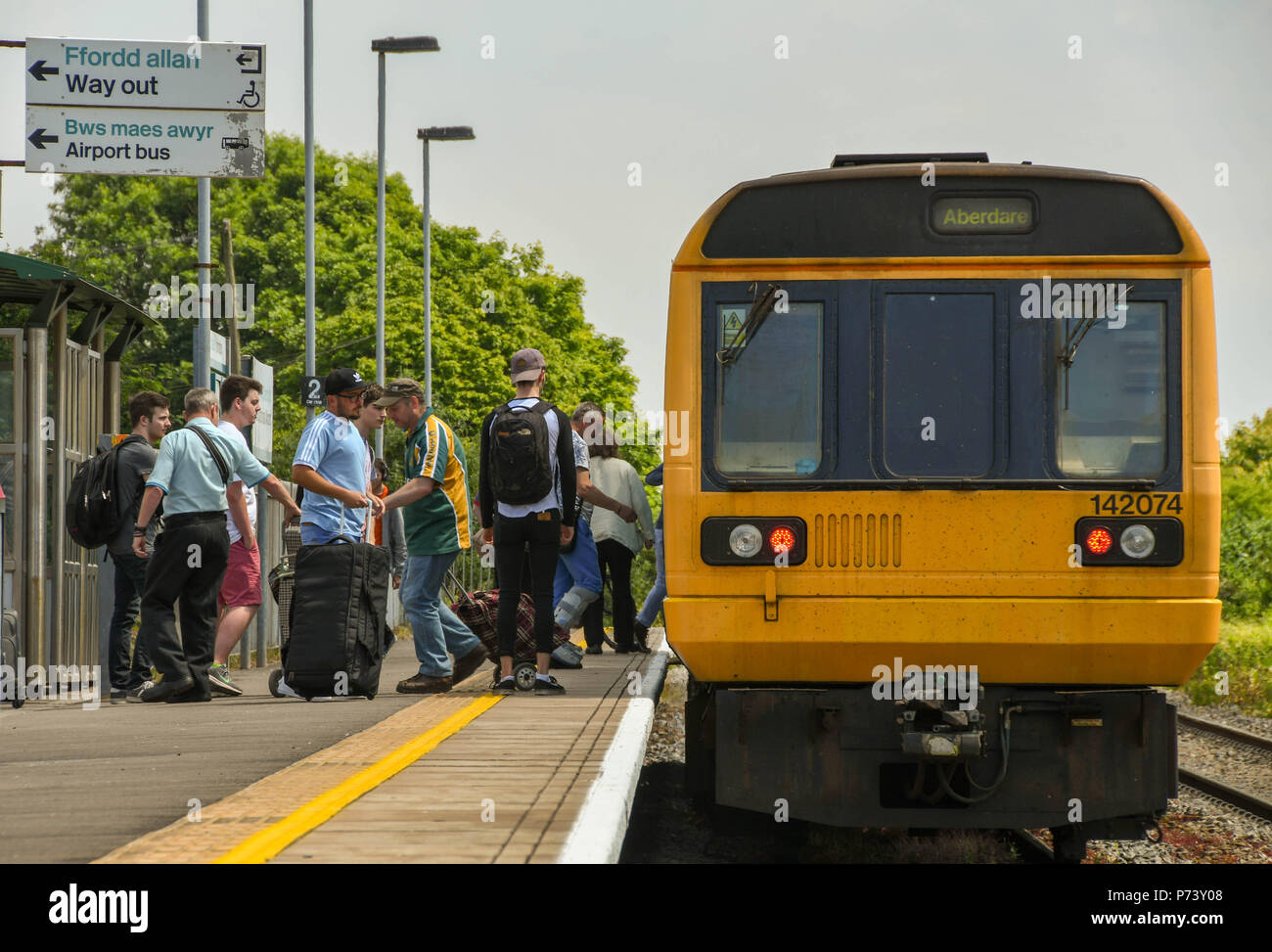 Passengers getting on a diesel commuter train on Platform 1 at Rhoose ...