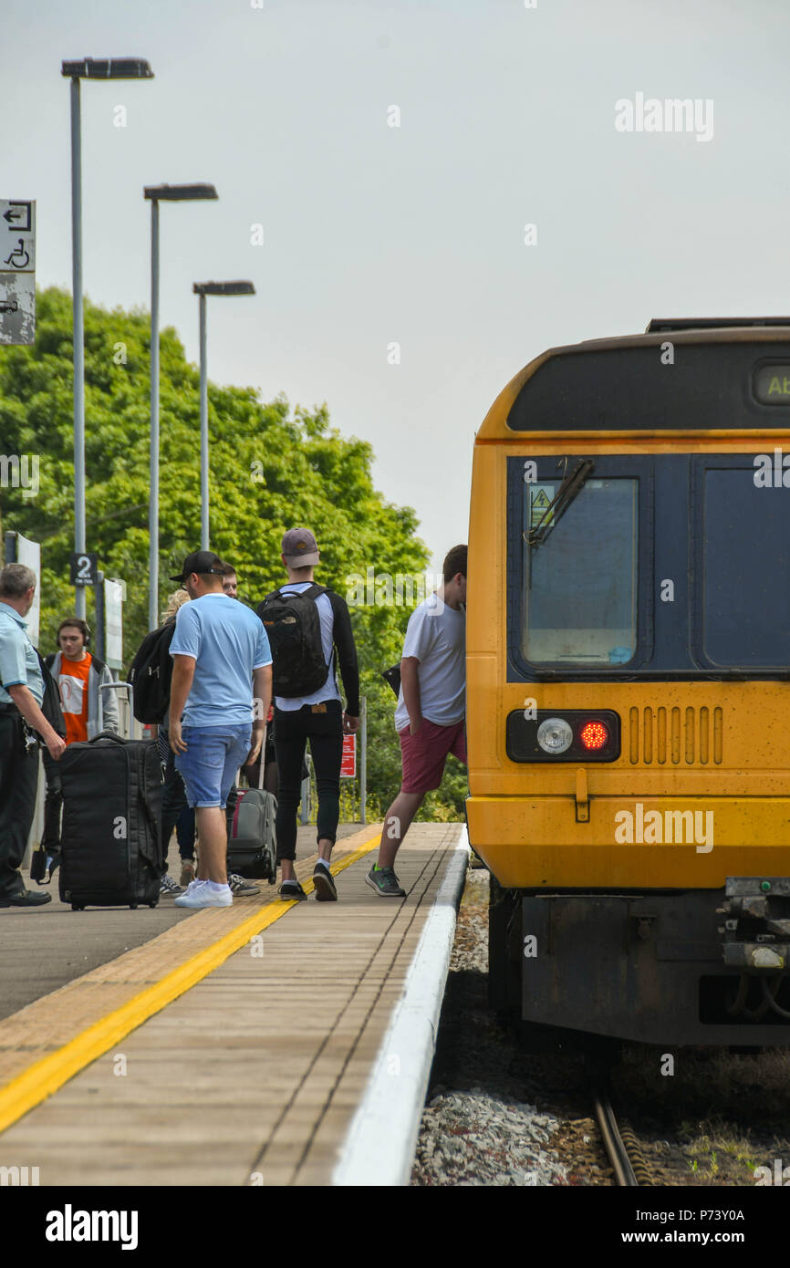Passengers getting on a diesel commuter train on Platform 1 at Rhoose ...