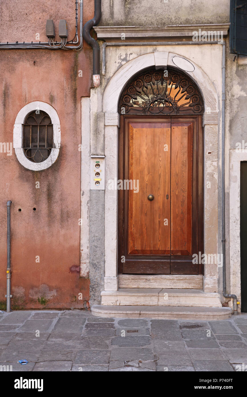 Oval window in old door hi-res stock photography and images - Alamy