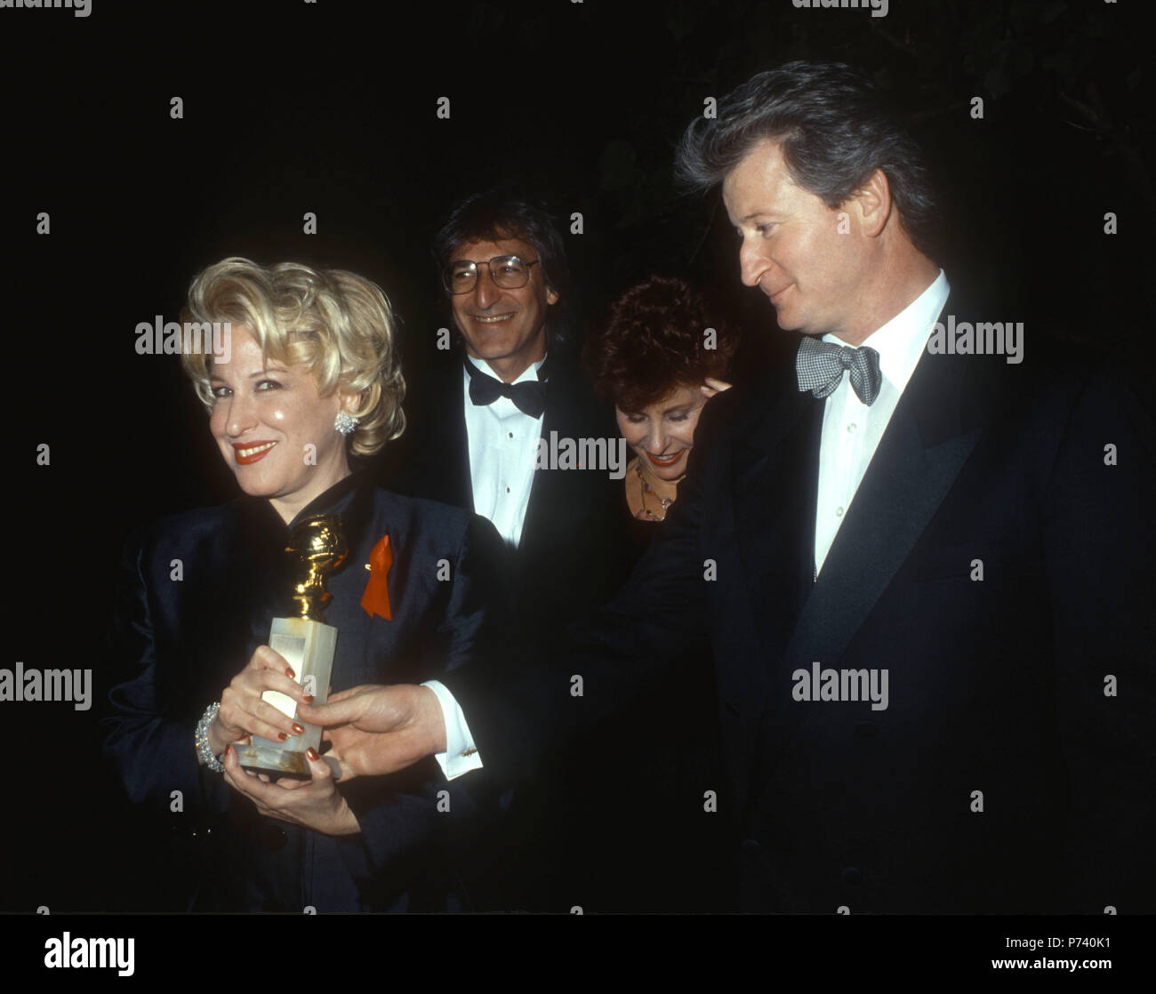 BEVERLY HILLS, CA - JANUARY 18: (L-R) Singer/actress Bette Midler and ...