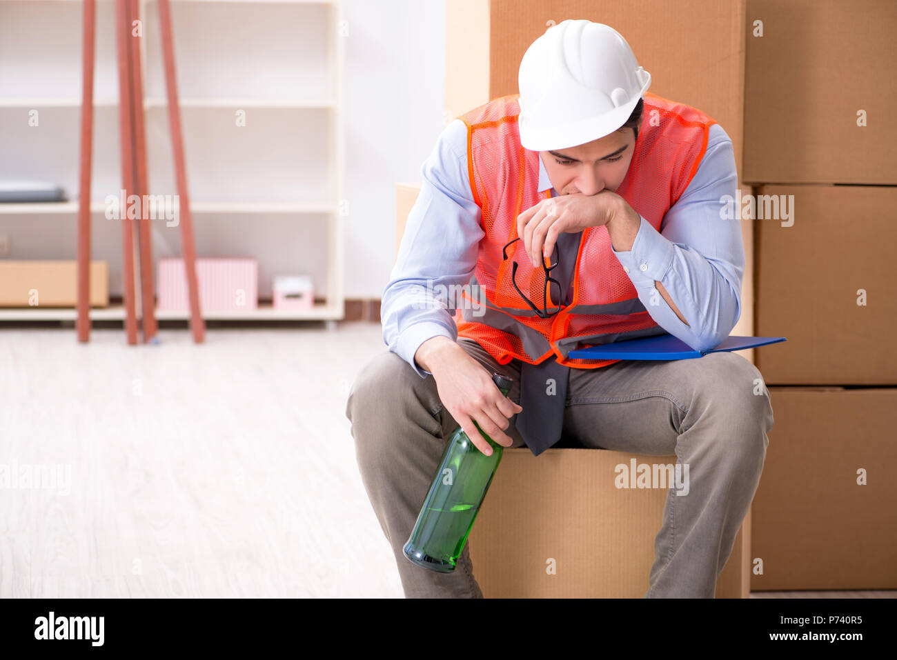 Delivery man drunk at work Stock Photo - Alamy