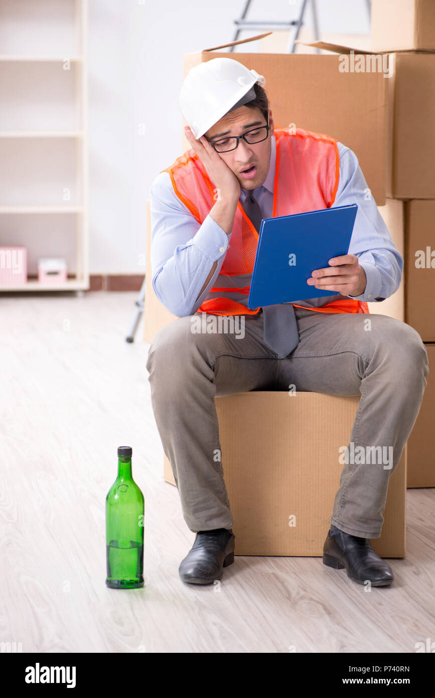 Delivery man drunk at work Stock Photo - Alamy