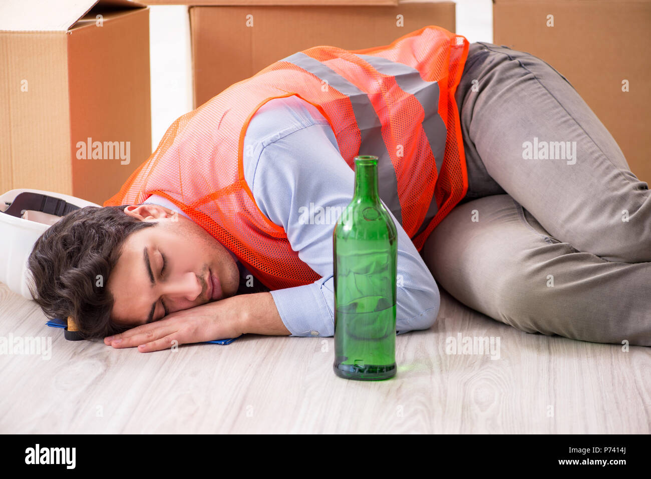 Delivery man drunk at work Stock Photo - Alamy