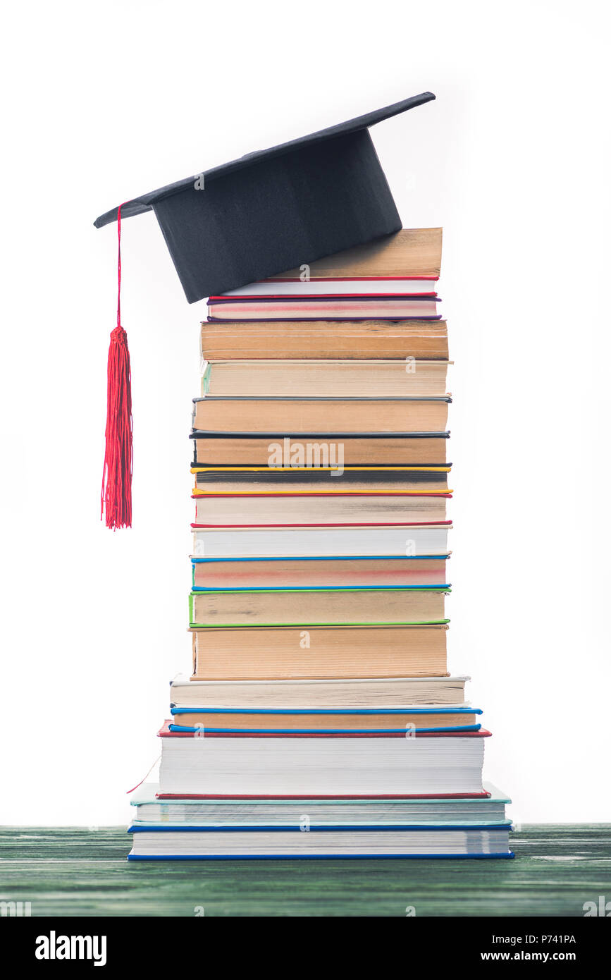 Hat graduation books hi-res stock photography and images - Alamy