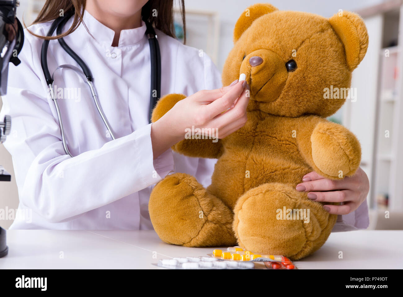 Child checking soft toy health Stock Photo - Alamy