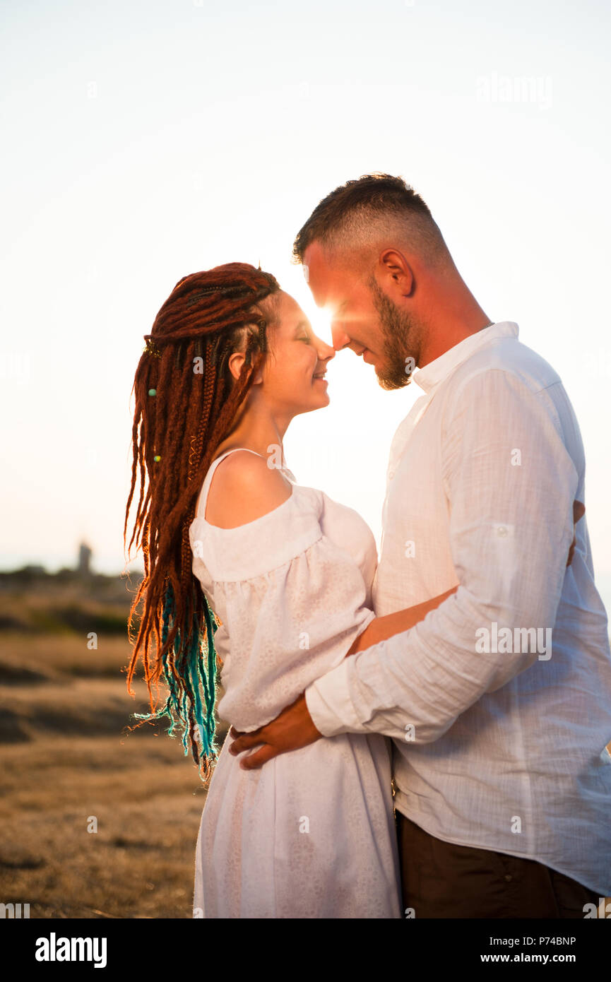 Couple with dreadlocks hugging hi-res stock photography and images - Alamy