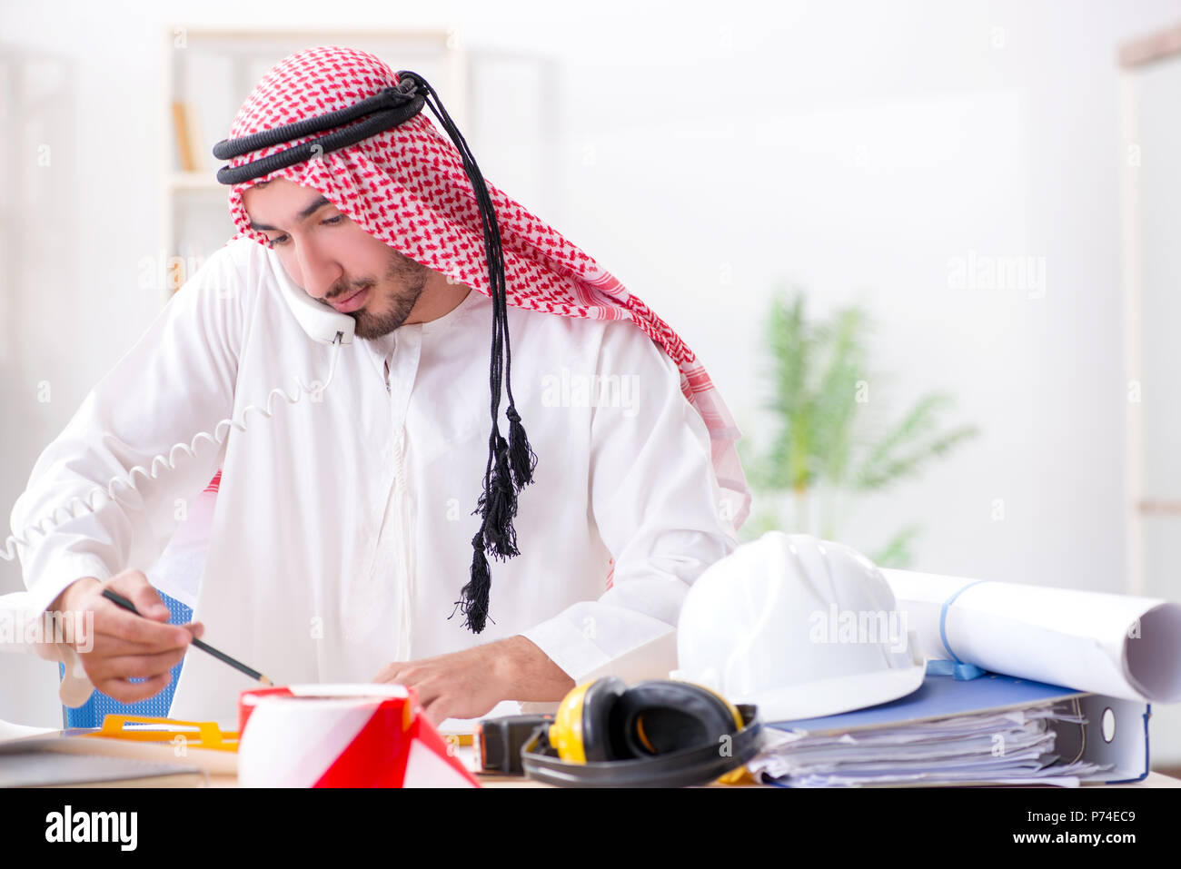 Arab engineer working on new project Stock Photo - Alamy