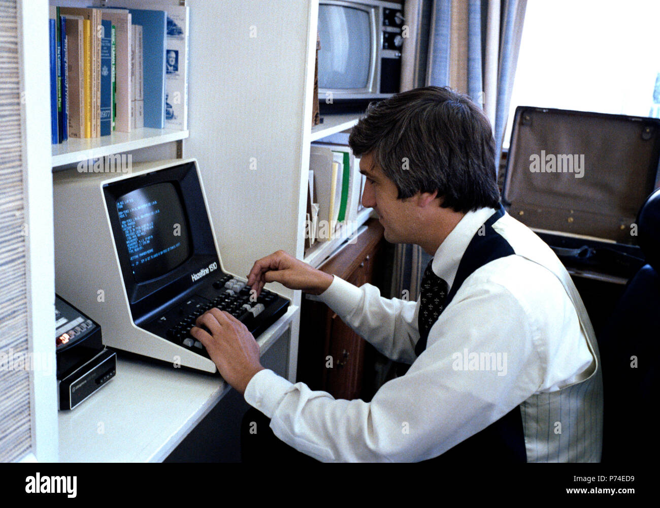 Man Working on a early desktop Computer (Hazletine 1510 computer) 1978 ...