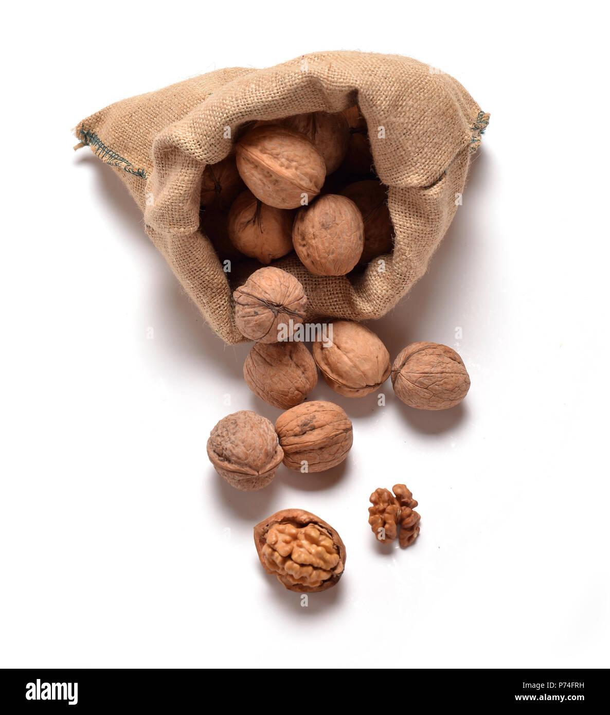 White sack full walnuts hi-res stock photography and images - Alamy