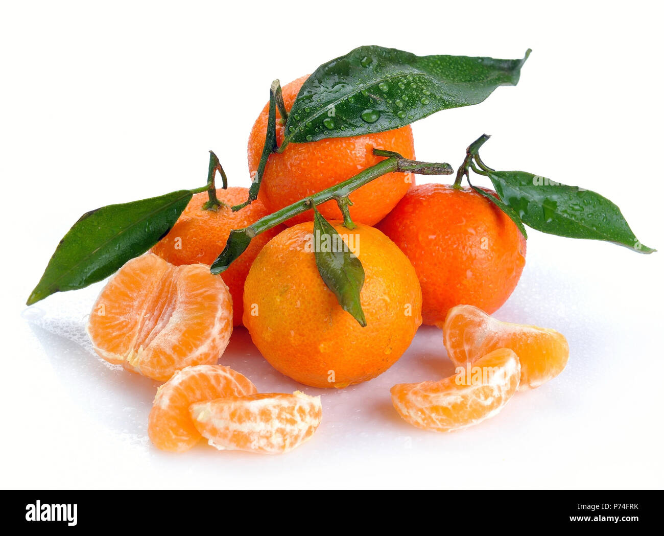 clementines with segments with drop on a white background Stock Photo ...