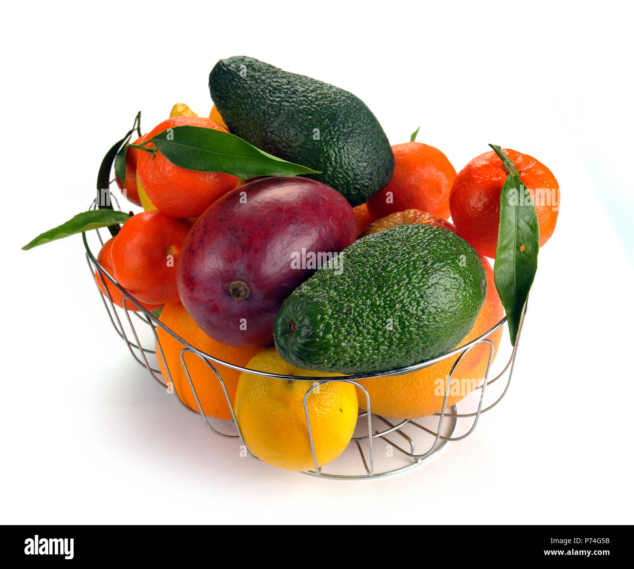 set of citrus fruits in basket on white background Stock Photo - Alamy