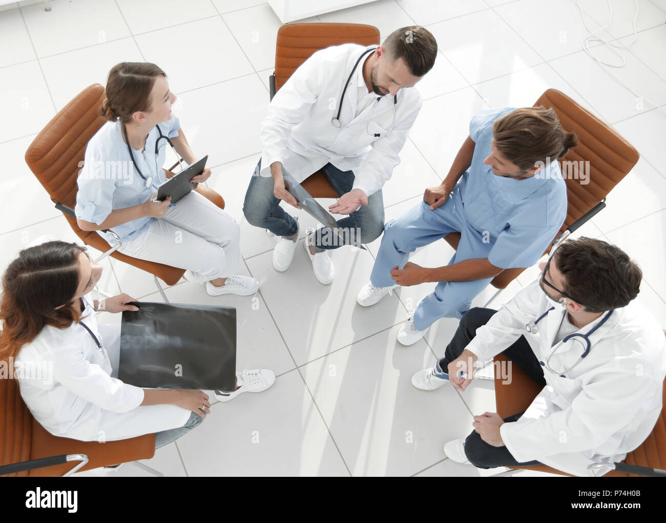 medical staff ,discussing the work plan with the patients Stock Photo ...