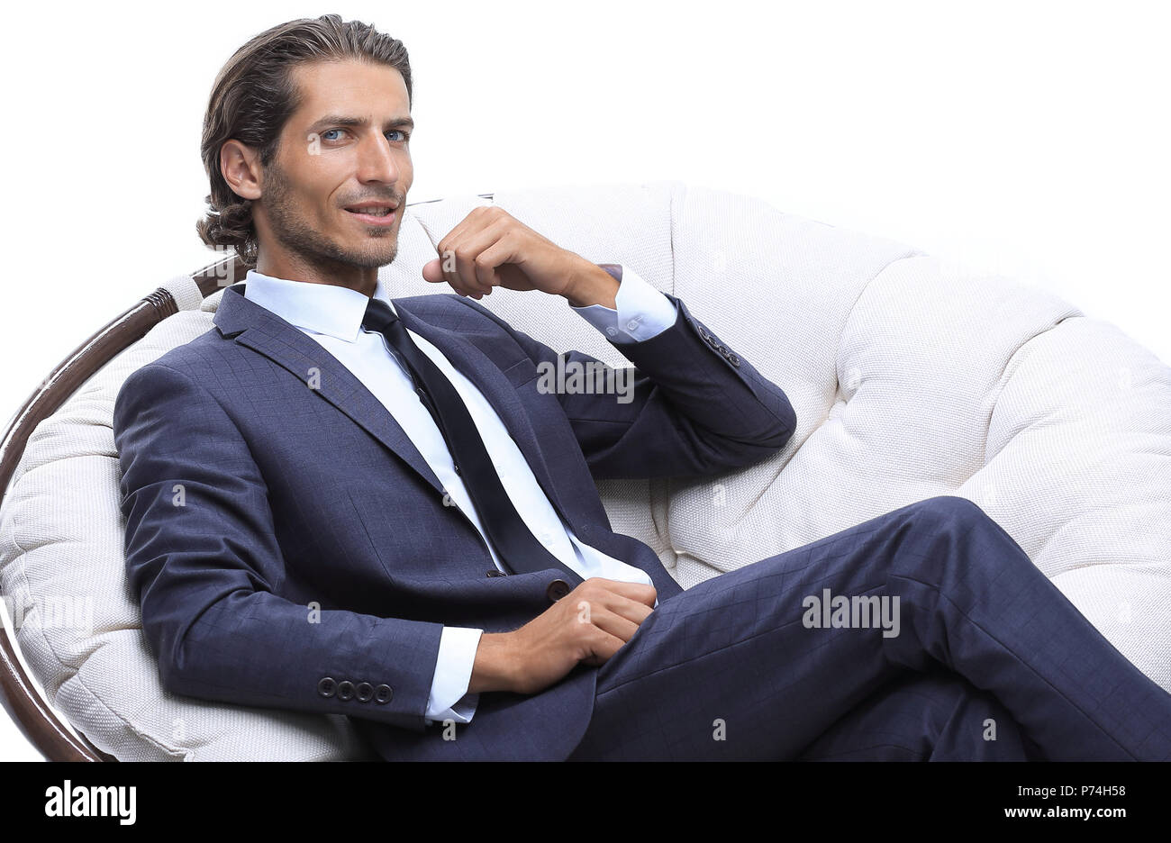 businessman sitting in a comfortable big chair Stock Photo - Alamy