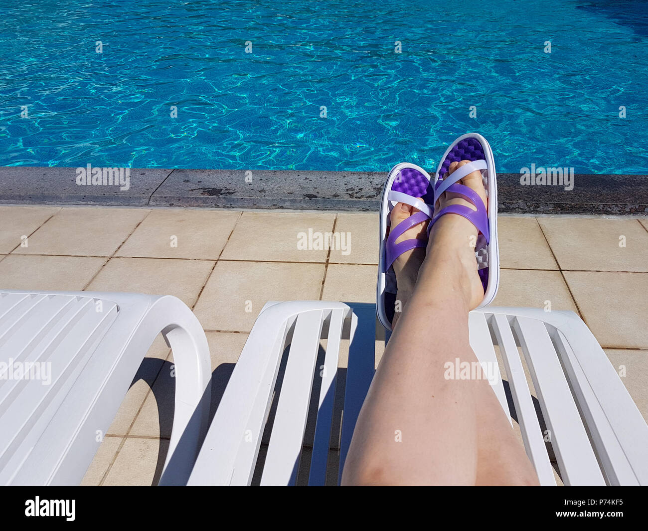 Sun lounger pool feet hi-res stock photography and images - Alamy