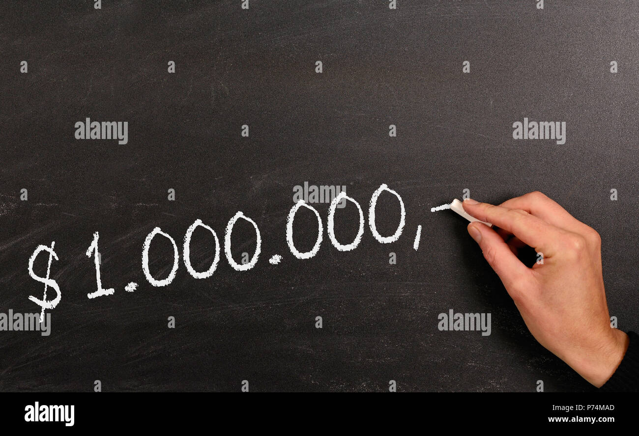 Businessman writing with chalk on a blackboard one million dollar Stock ...