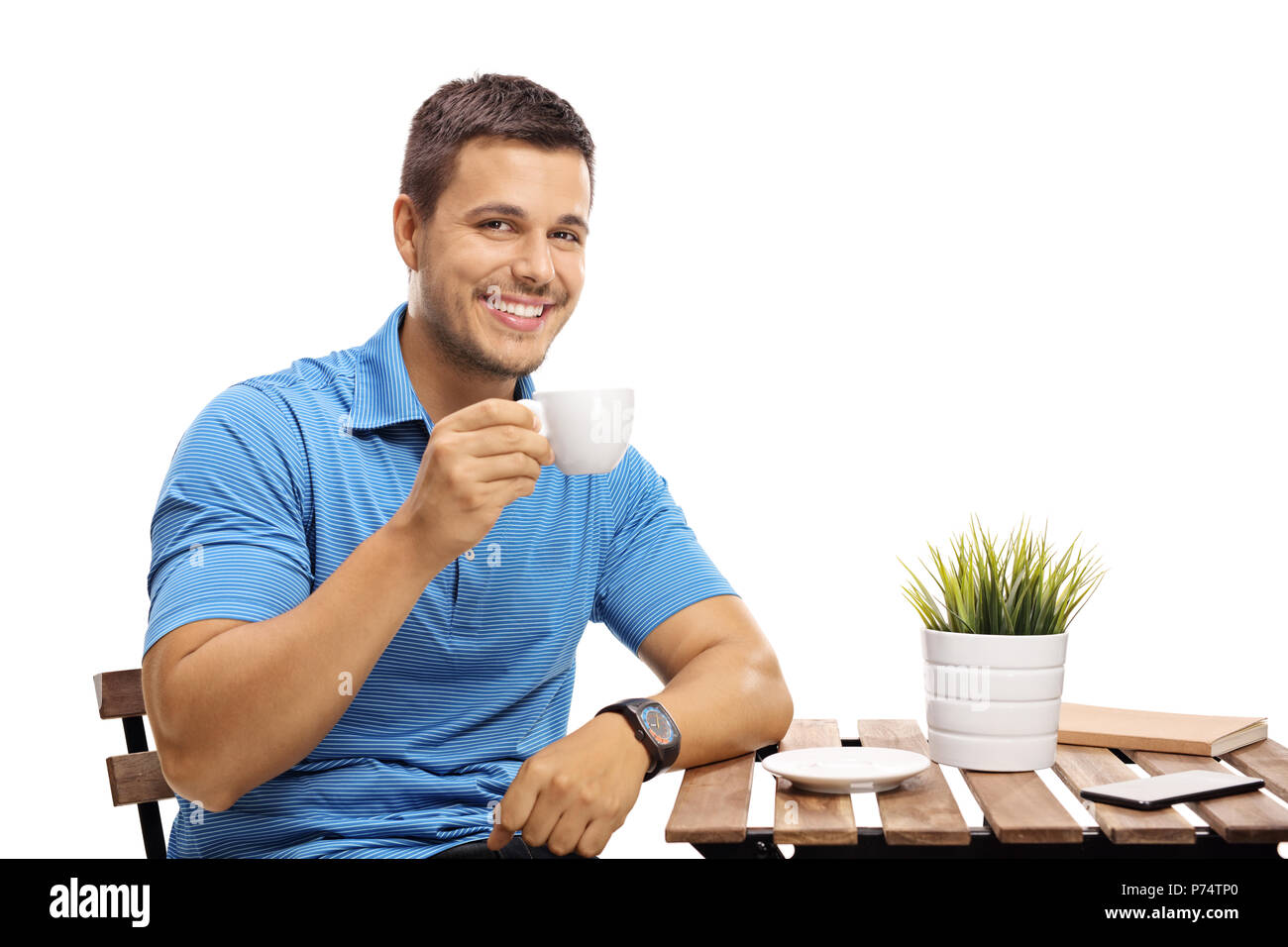Man sitting table holding hi-res stock photography and images - Alamy