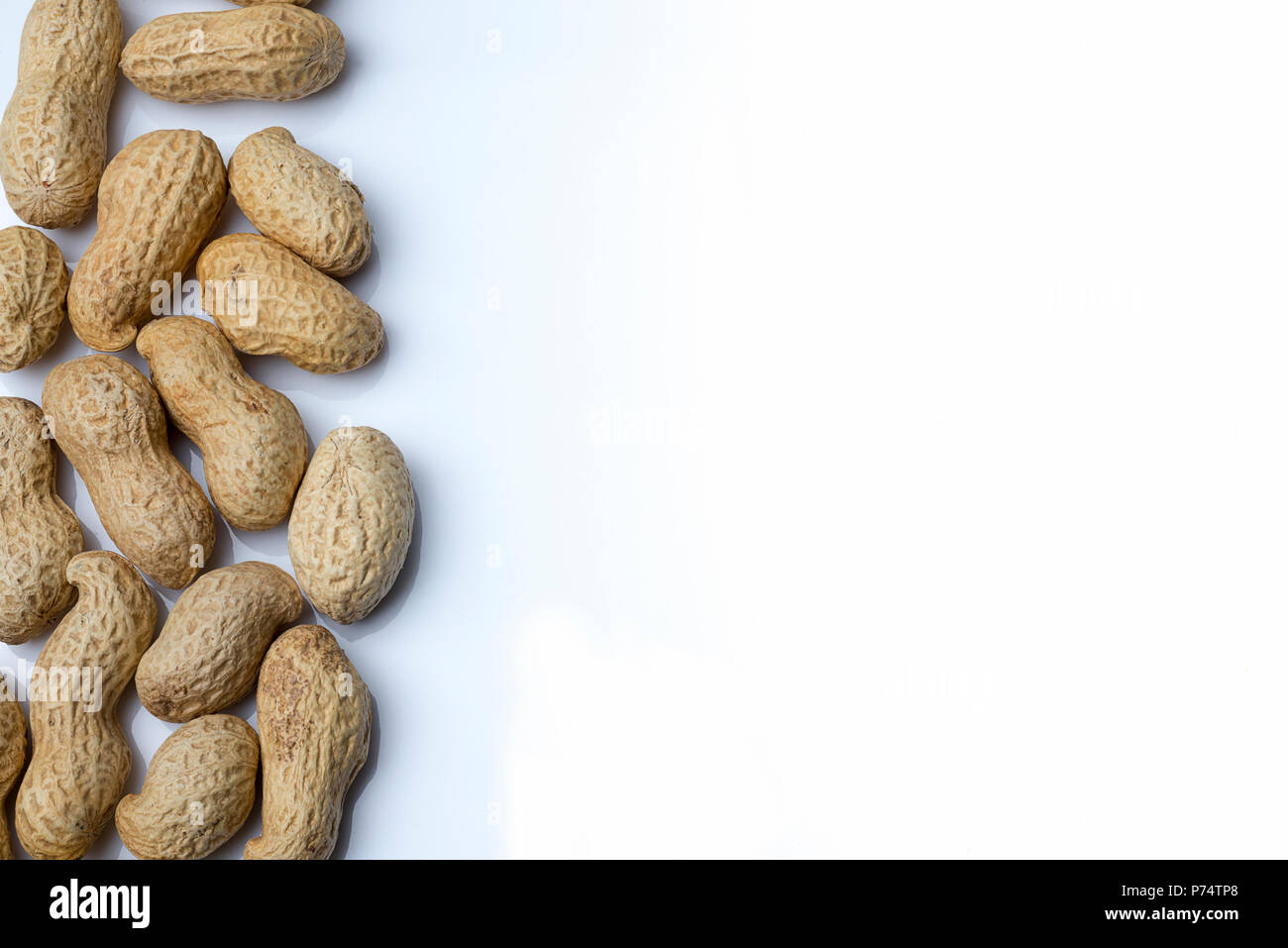 Peanut in the shell close-up. Isolated space for text Stock Photo - Alamy