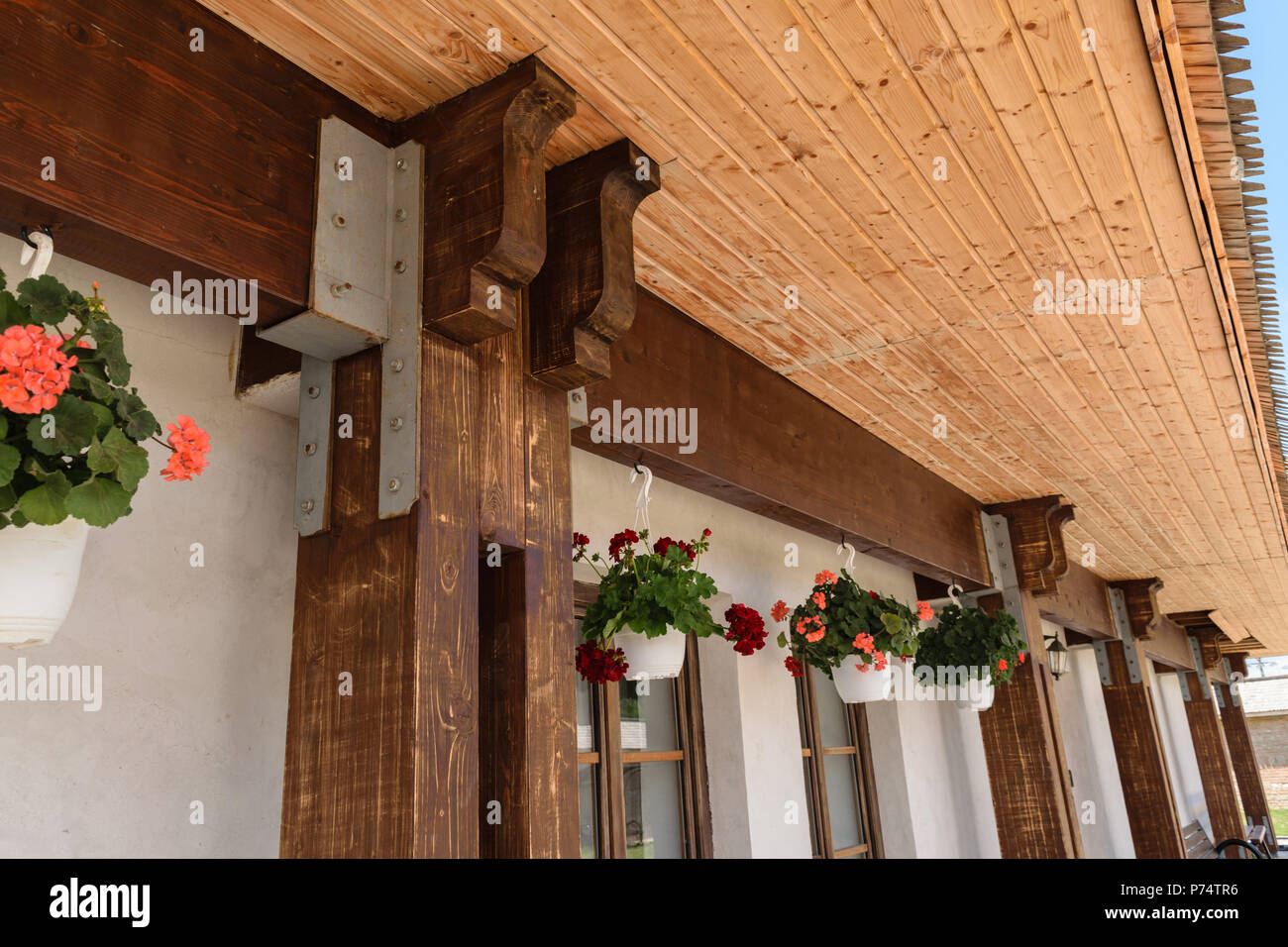 closeup of wood beam and pillar junction professionally connected by ...