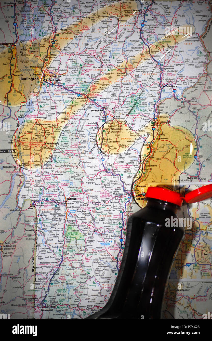 Maple Syrup pictured with a map of Vermont Stock Photo - Alamy